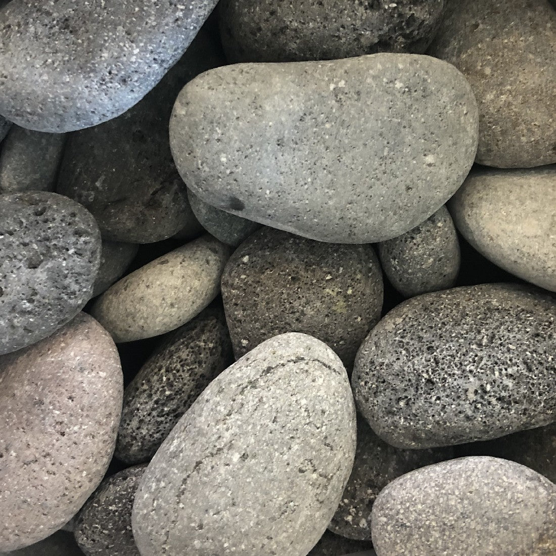 Grey River Pebbles 60-100mm M3 – Lumpys Nursery & Landscape Yard